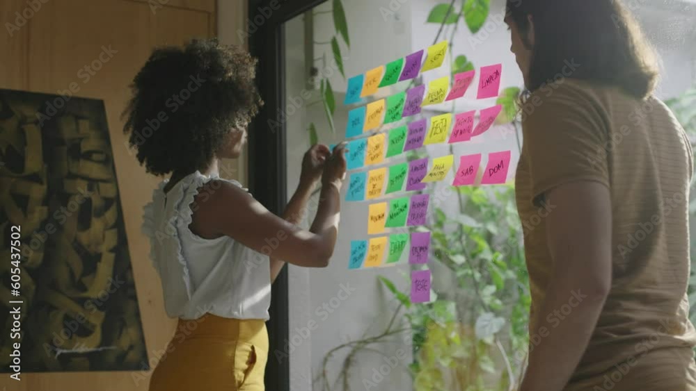 A smiling happy office corporate black woman Write Tasks Creative Ideas ...