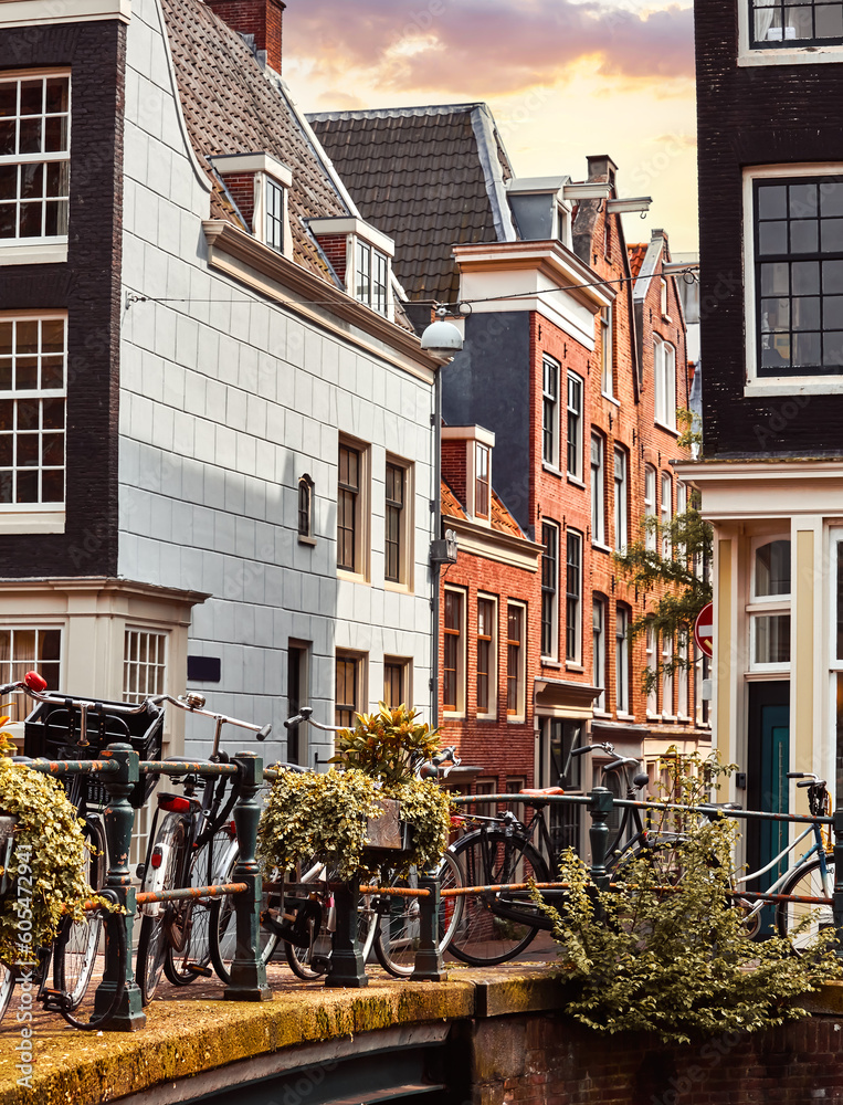 Amsterdam, Netherlands. Bikes on the bridge over channel in Amsterdam ...
