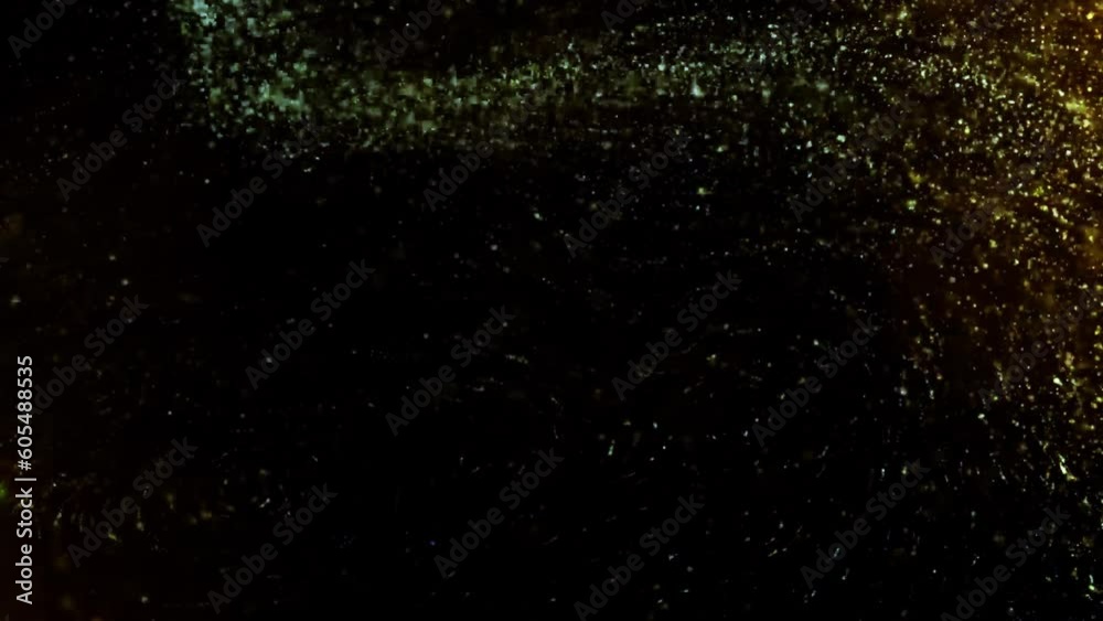 Gold Dust Waves. Particle gold dust flickering on black background ...