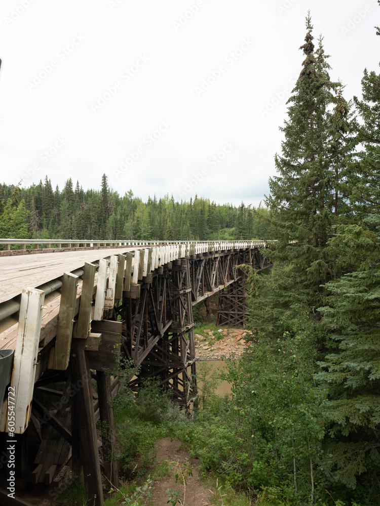 Vertical image of Old wooden plank bridge in British Columbia which was ...
