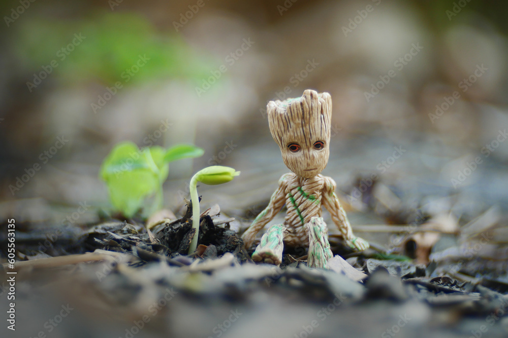 CHIANGMAI, THAILAND - MAY 2023 : Baby Groot is sitting with young plant ...