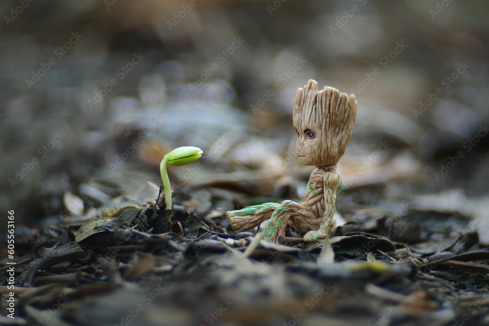 CHIANGMAI, THAILAND - MAY 2023 : Baby Groot is sitting with young plant ...