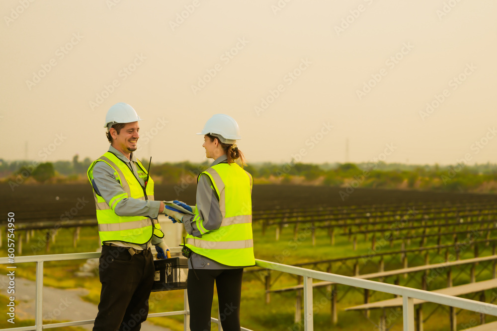 Engineers inspecting construction of solar panel at roof top. solar ...