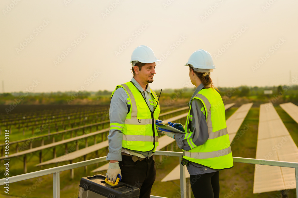Engineers inspecting construction of solar panel at roof top. solar ...