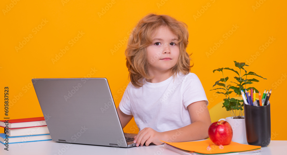 School child using laptop computer. School child student learning in ...