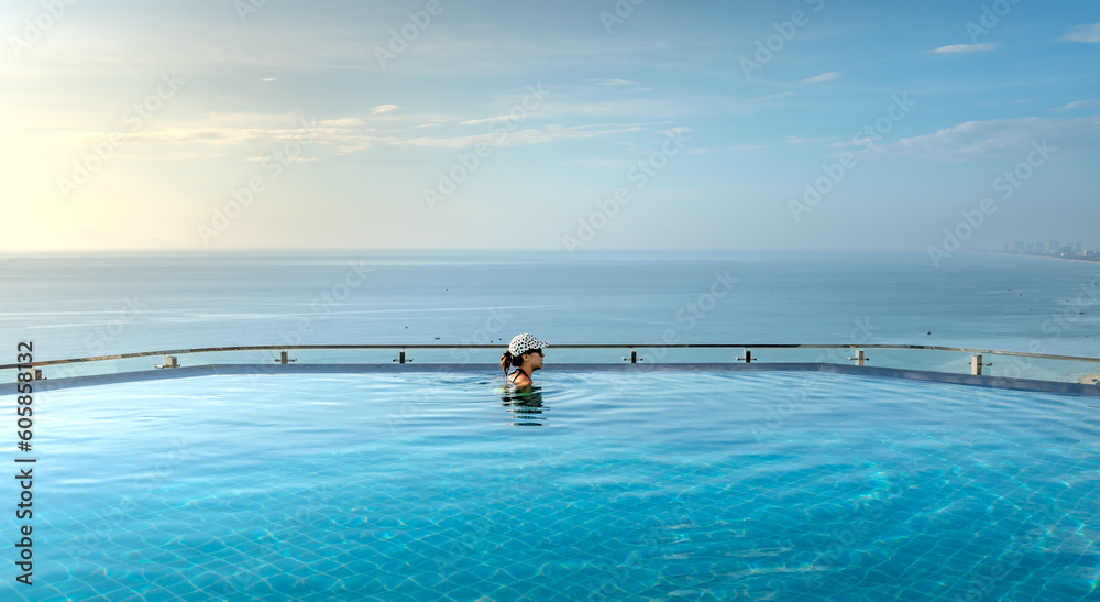 Visitors experience the infinity pool at the 5-star Radisson Da Nang ...