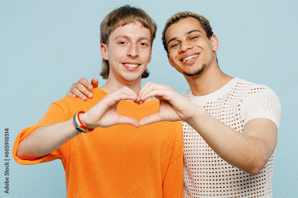 Young couple two gay men wear casual clothes together showing shape ...
