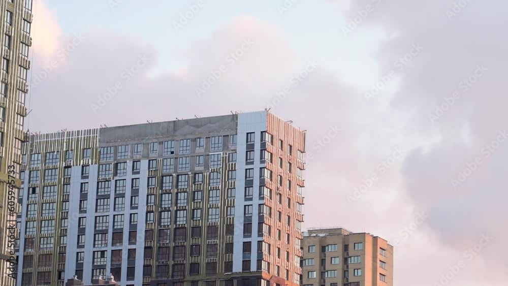 Installation of external thermal insulation of walls with stone wool on ...