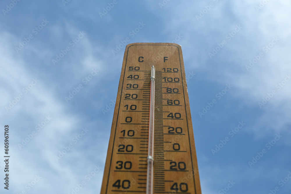 the thermometer shows a temperature of 39 degrees Celsius or 100 ...