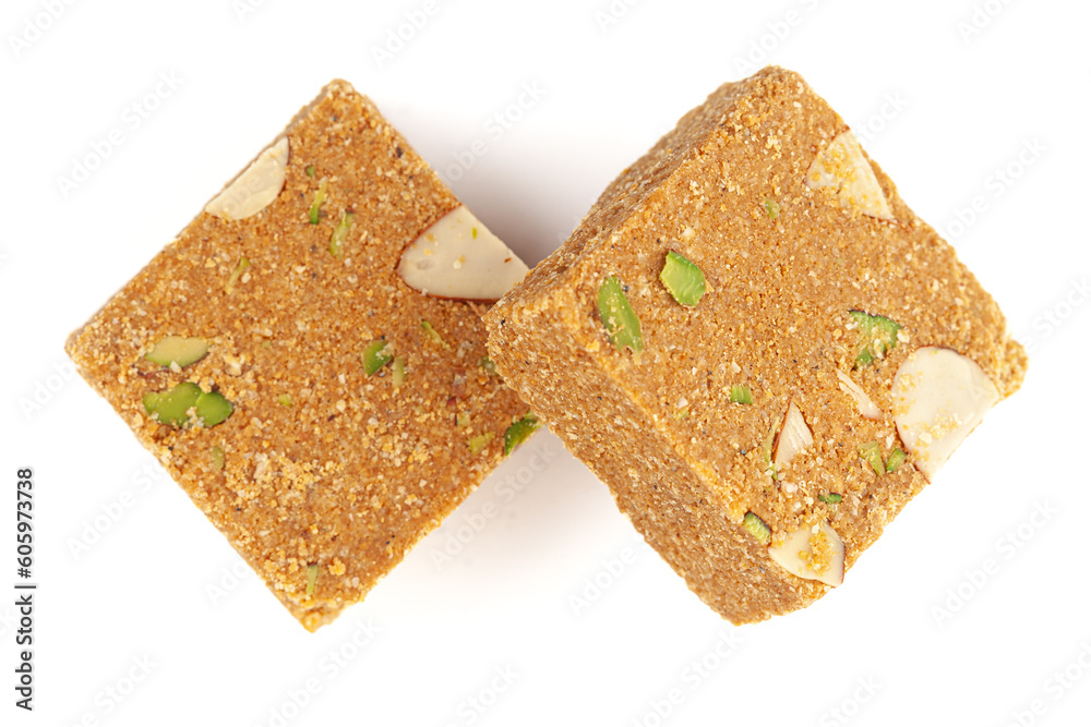 Two pieces of Homemade Indian mithai (dessert) Besan Gajak Barfi. Made ...