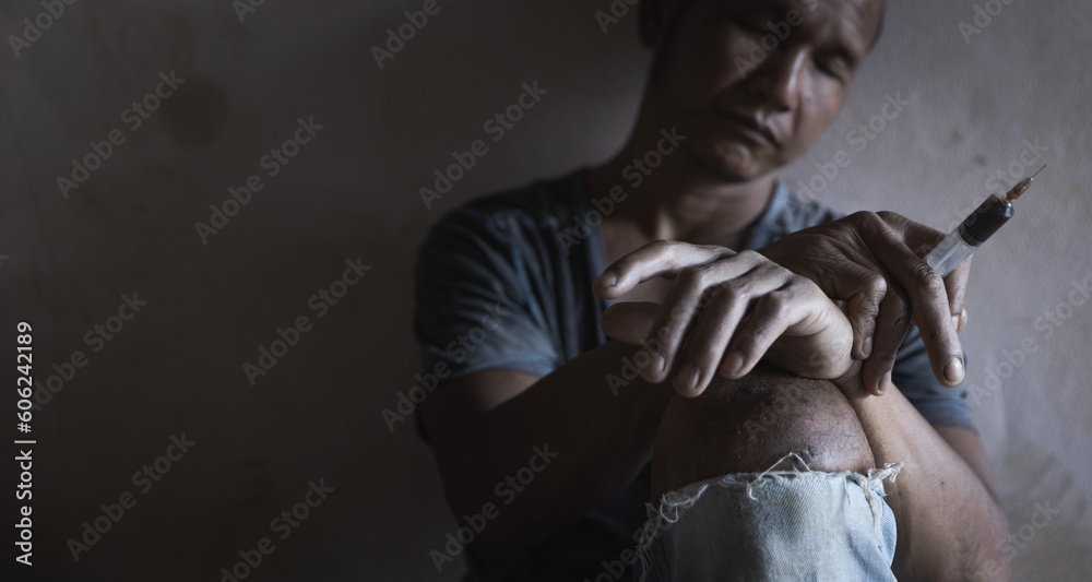 Syringe in overdose asian woman drug addict hand. drug overdose.Social ...