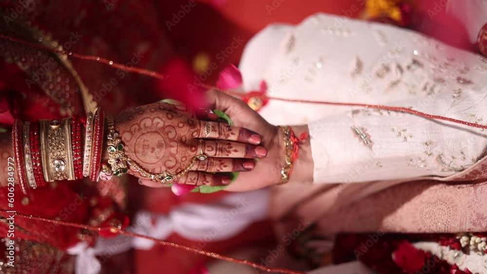 Indian Hindu wedding slow motion video background . Couple holding each ...