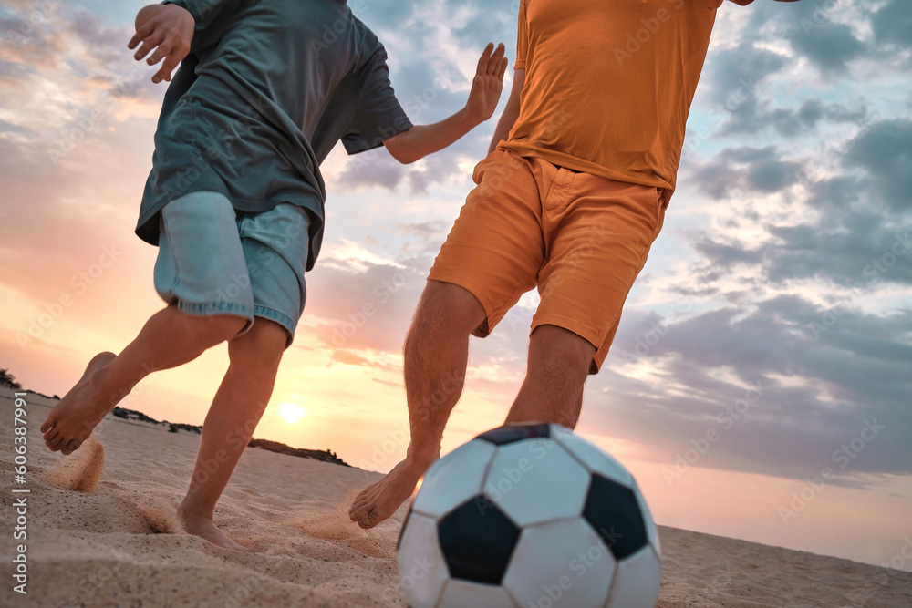 Father and Son playing football, family fun outdoors players in soccer ...