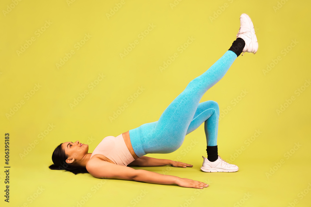 Fit Indian Girl Doing Glute Bridge for Stroung and Round Hip Muscles ...