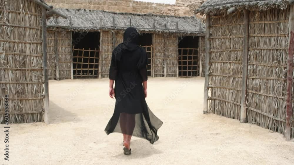 Muslim woman in hijab headscarf on head walking in abandoned islamic ...