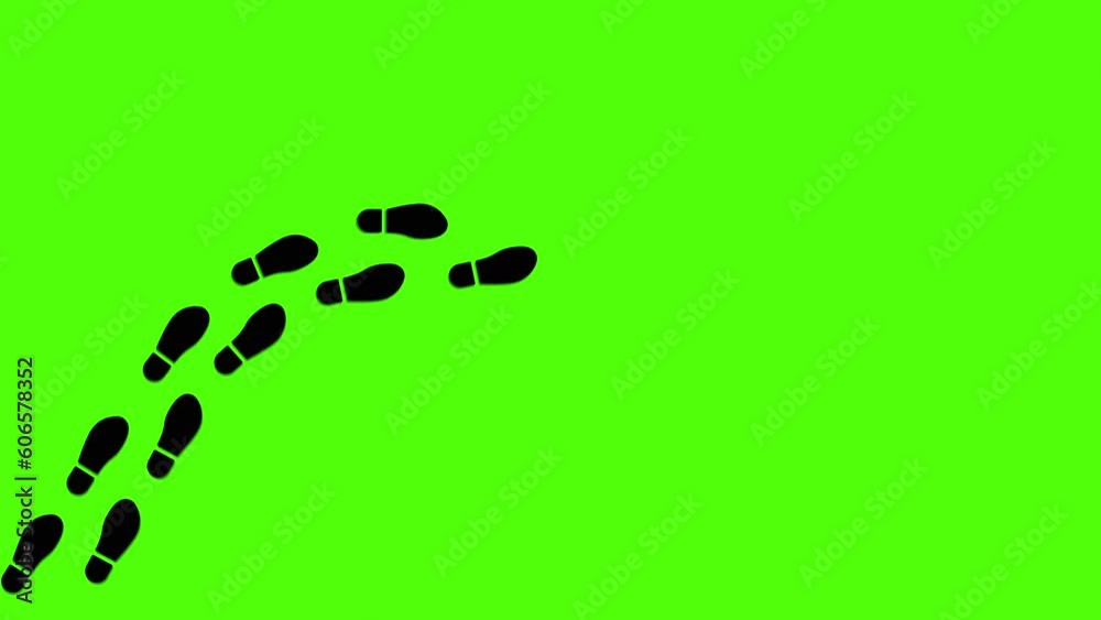 Trail of footprints on green screen background. Black silhouettes of ...