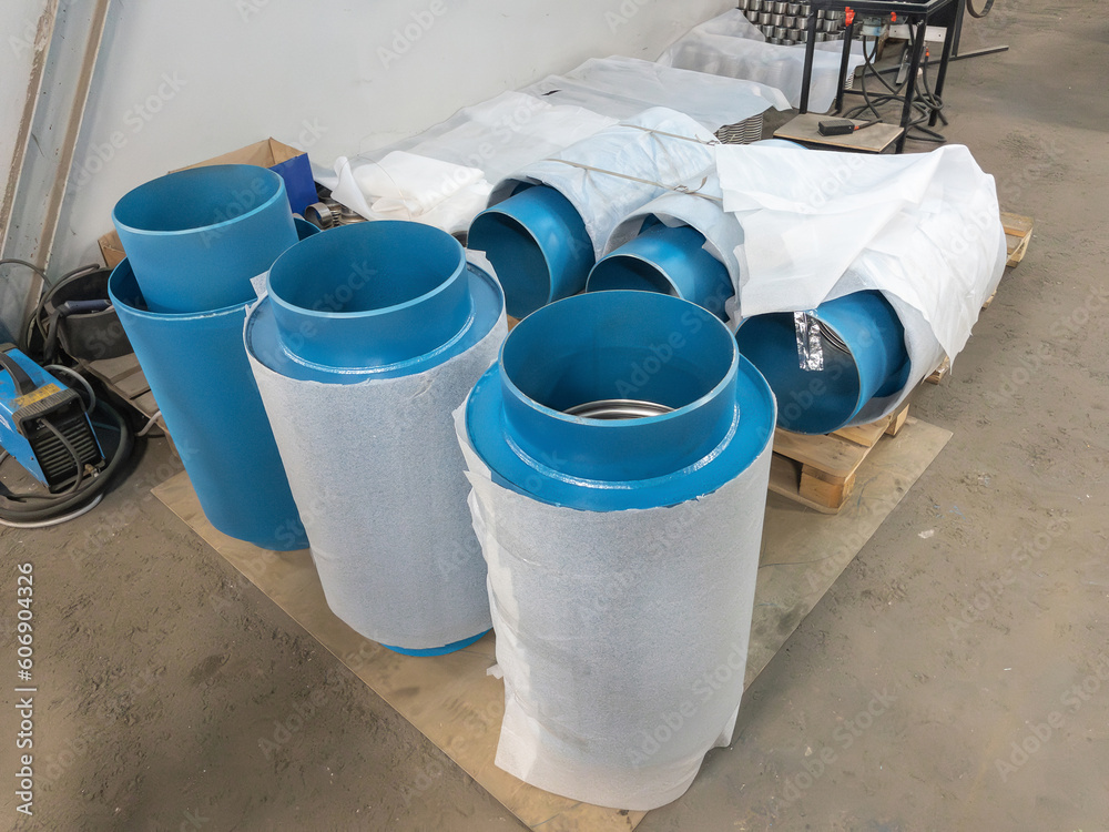 Blue flange expansion joints on the ground production area on the ...