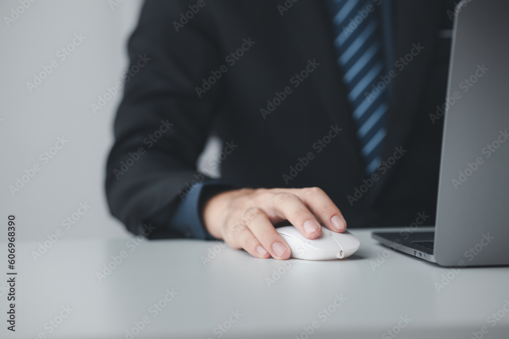 Person typing on laptop keyboard, businessman working on laptop, he is ...