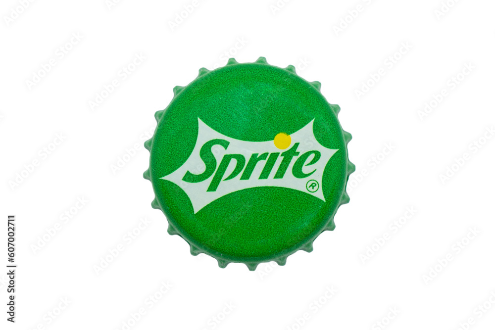 Yerevan, Armenia, May 20, 2023: Sprite soft drink cap laying on white table. Sprite logo and ...