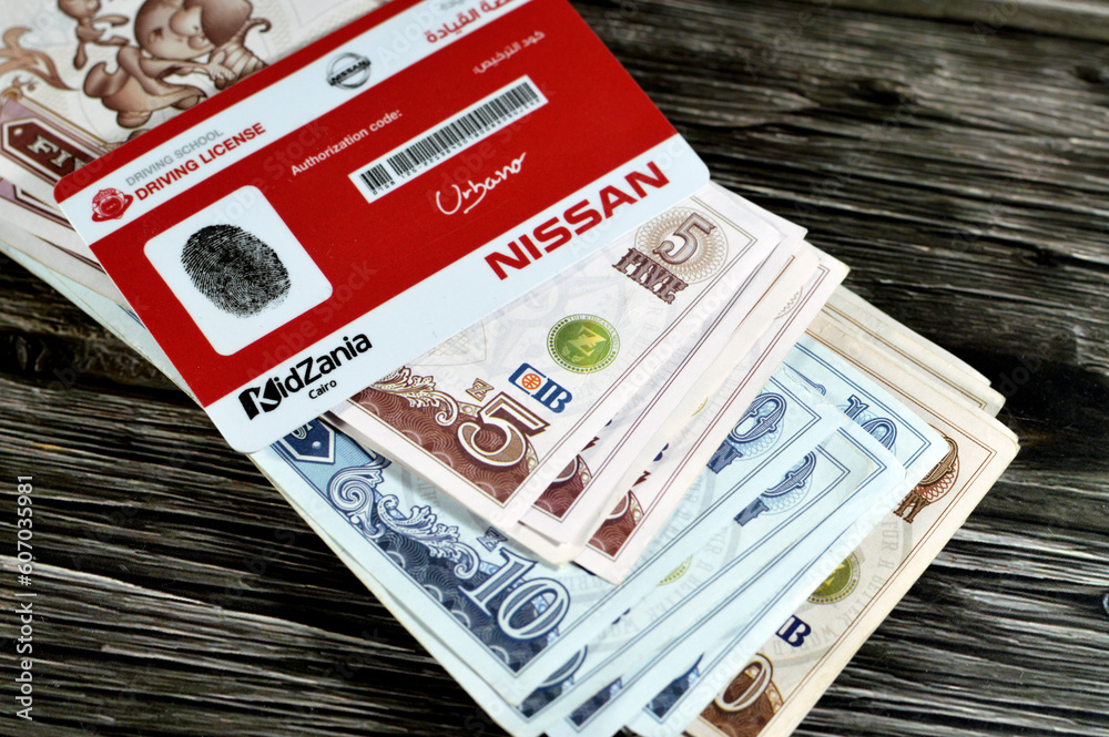 Cairo, Egypt, May 26 2023: KidZos money, Driving license of KidZania, a ...