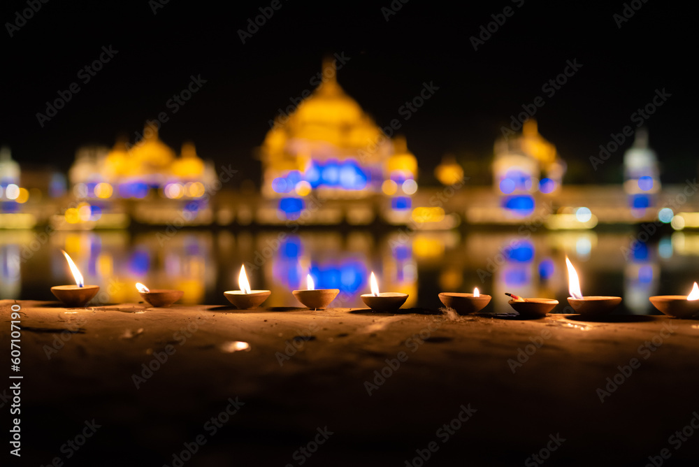 fire lamps on the background of the shrine, night view, sacred place ...