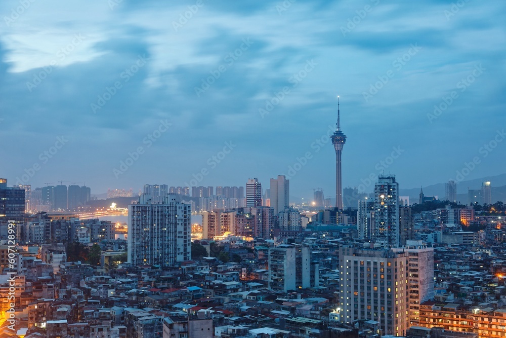 Urban skyline of vibrant Macau City in blue misty morning twilight ...