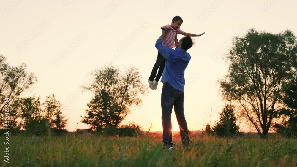 Family game concept, Child, superhero, fly. Dad plays with his son ...