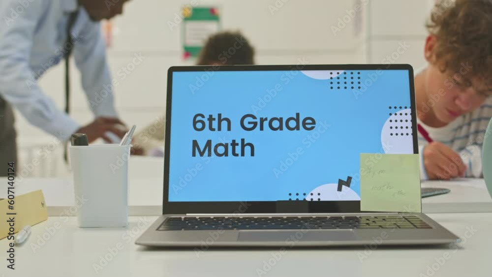 PAN shot of diverse 6th grade students and their Black male teacher ...
