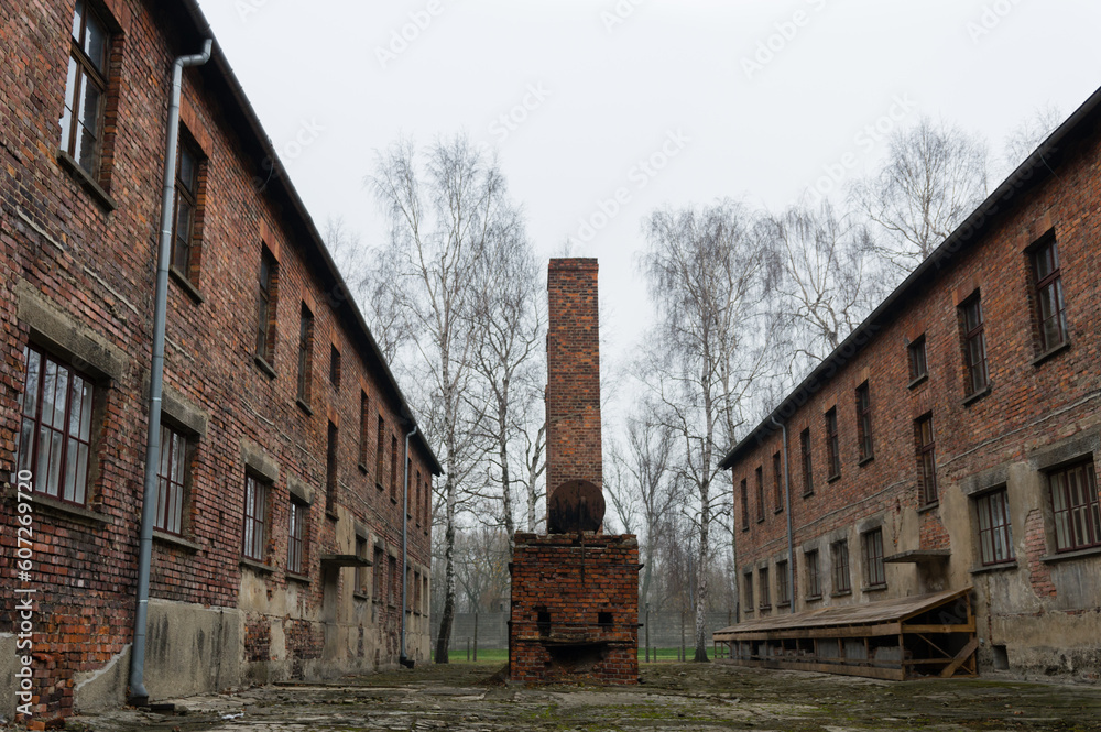 Chimneys between blocks of the Auschwitz nazi concentration camp. Stock ...