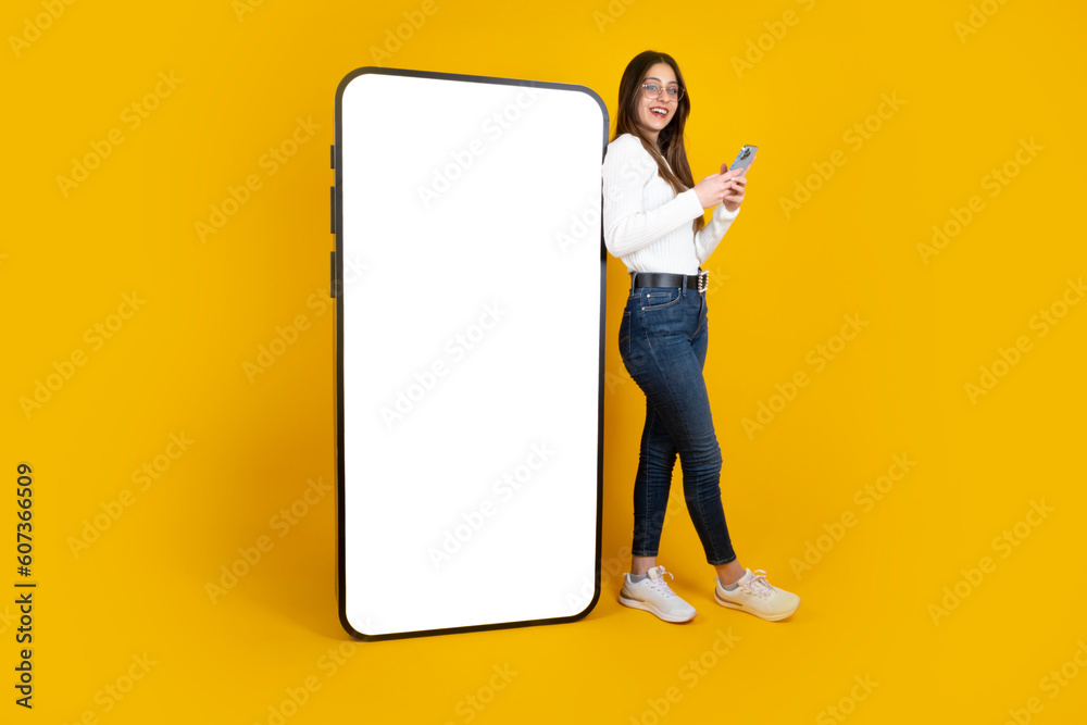 Full length body view woman leaning standing near big huge blank screen ...