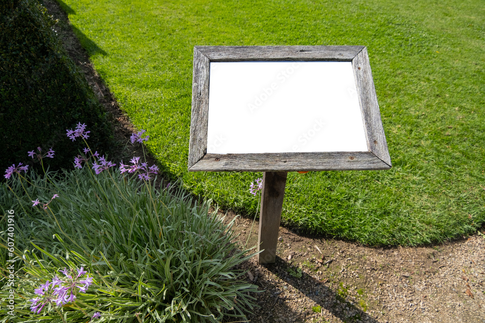 Blank white mockup template of a small notice board in a park with ... Blank white mockup template of a small notice board in a park with ...