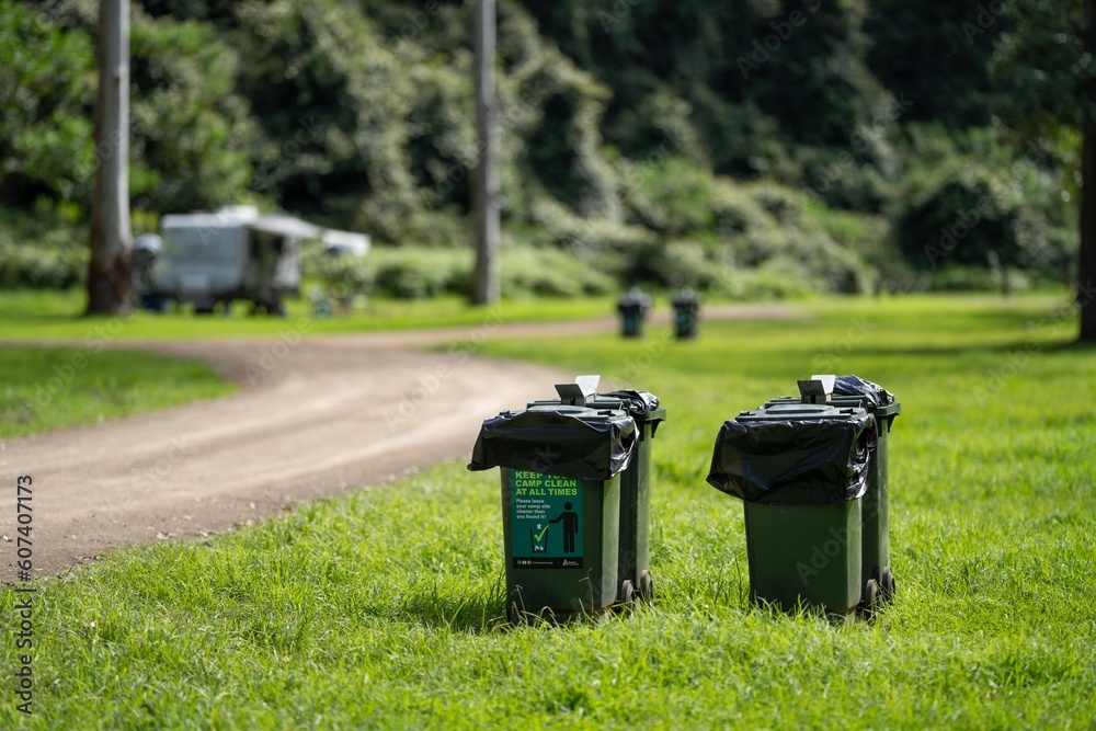Bins at a campground. Efficient Waste Management System with Wheelie ...