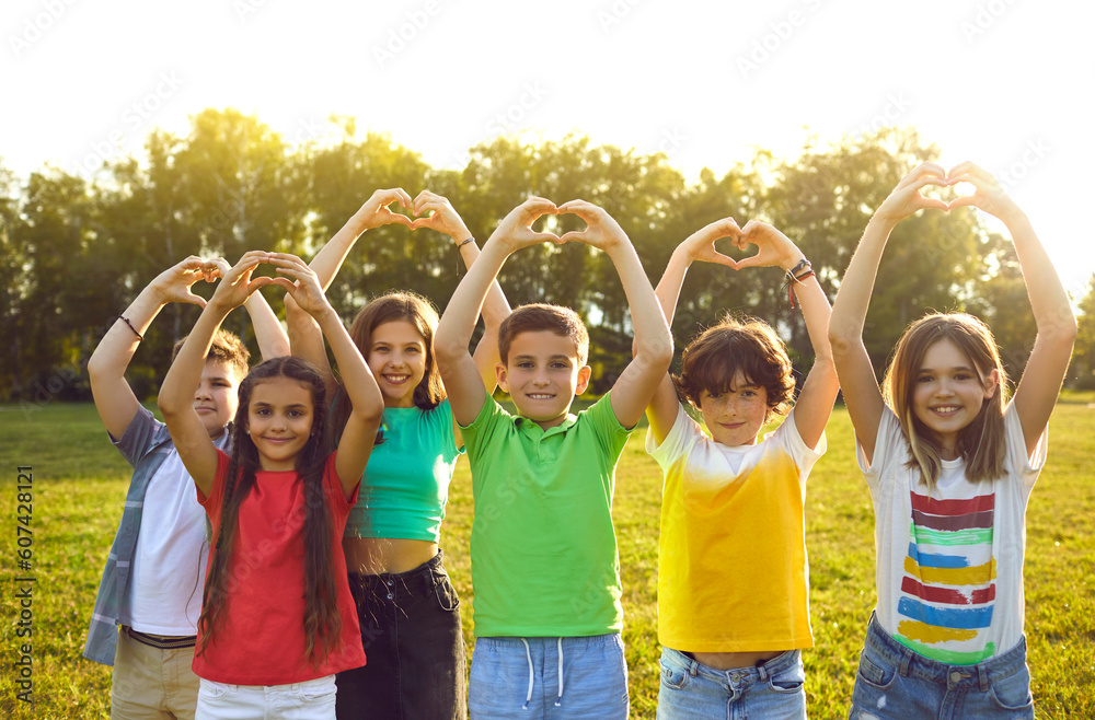 Happy children wish for world peace. Cheerful healthy kids standing on ...