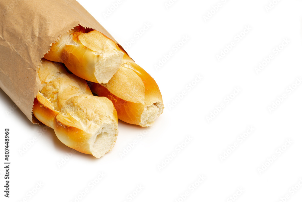 Pan fresco y natural asomándose de una bolsa de papel marrón sobre un ...