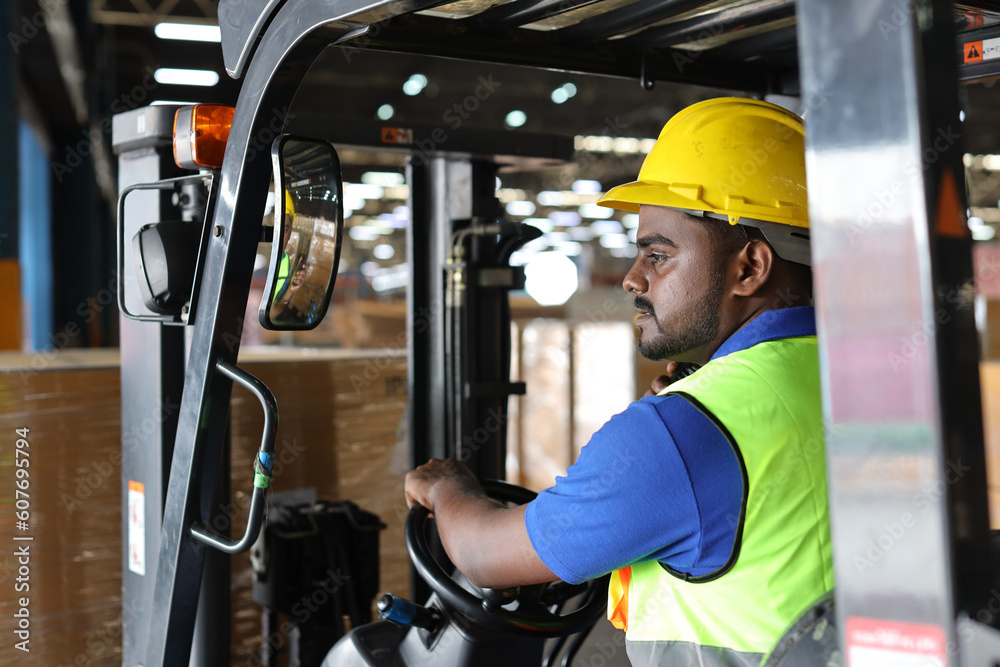 Warehouse workers or forklift driver man with hardhats and reflective ...