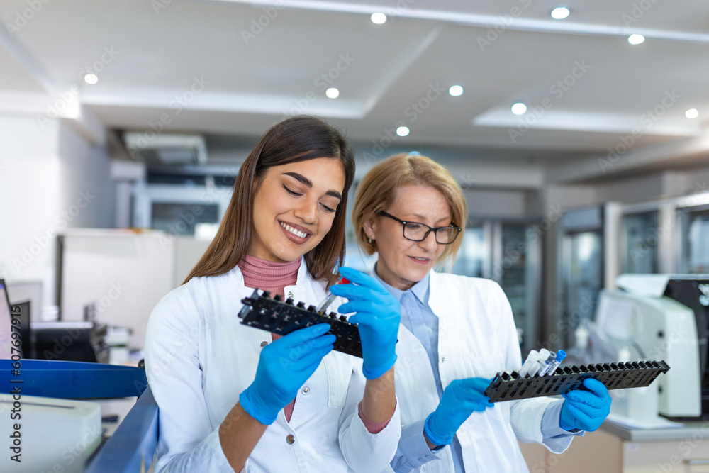 Female Research Scientist Holds Test Tubes with Blood Samples before ...