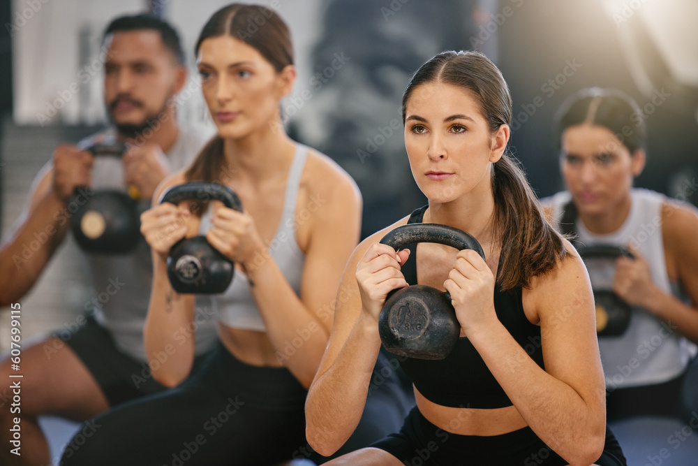 People weightlifting, kettlebell and fitness, exercise class in gym for ...