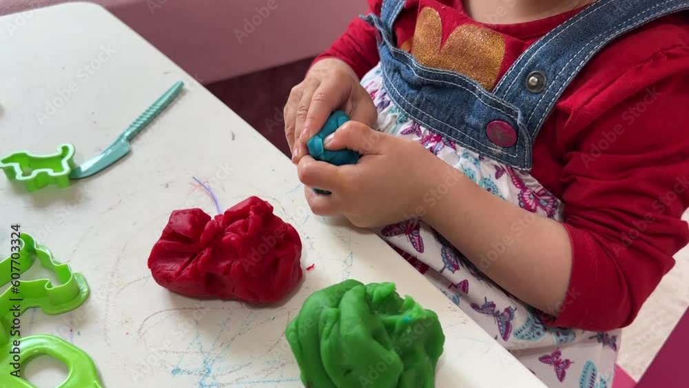Little kids playing with play dough. Child development. Sensory ...