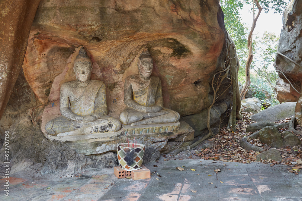 Phnom Santuk, a sacred Buddhist pilgrimage spot in Cambodia, known for its rock carvings and ...