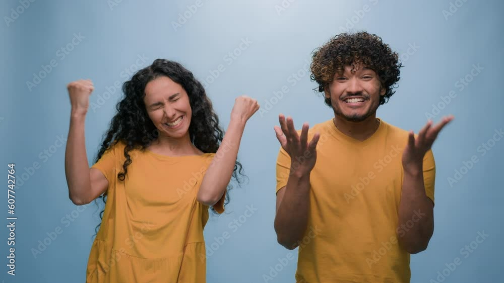 Excited happy shocked wonder amazed surprised Arabian couple winners ...