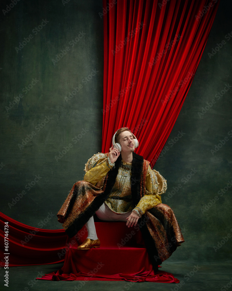 Delightful. Portrait of young man, royal person, prince listening to ...