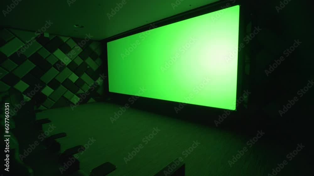 Modern cinema, view of the big green screen in the cinema room ...