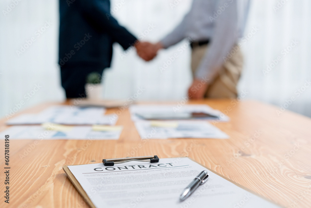 Table top view focus image of contract document on meeting table with ...