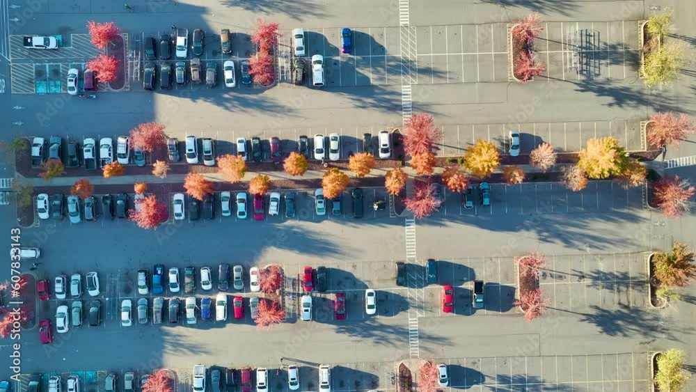 View from above of many parked cars on parking lot with lines and ...