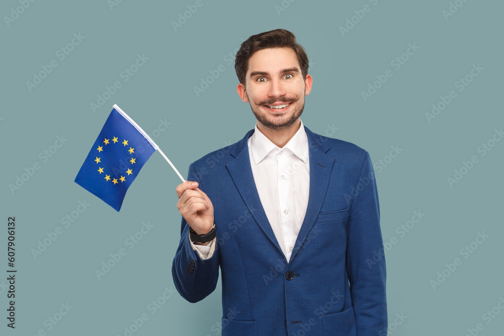 Portrait of smiling happy handsome man with mustache standing waving ...