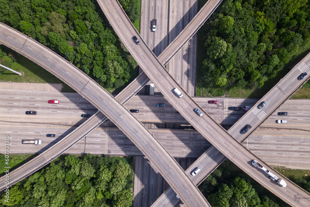 An aerial view of a highway intersection with a traffic intersection ...