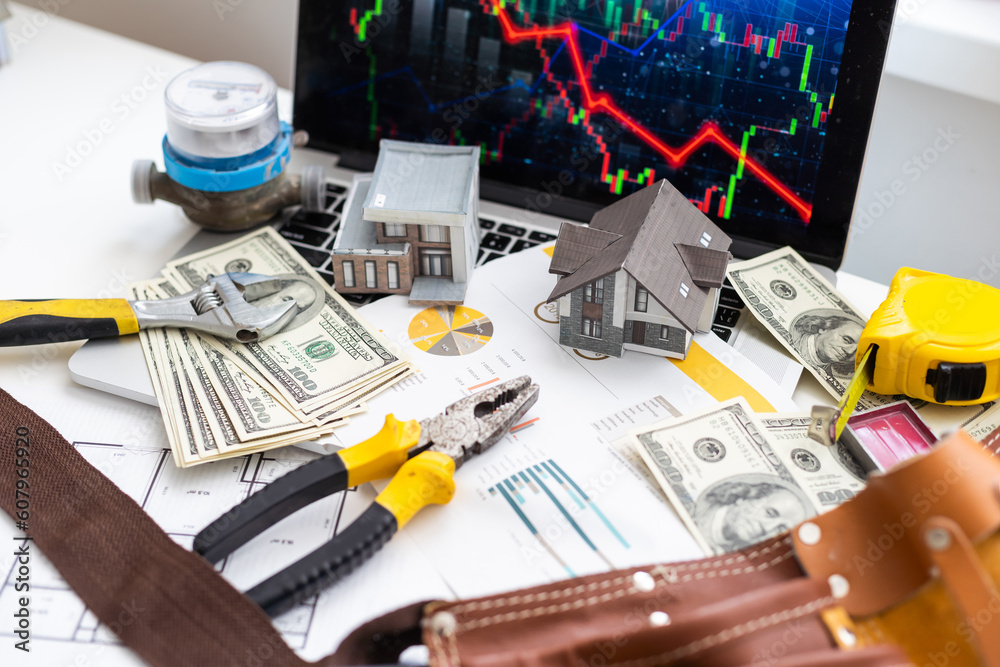 Working on construction project background. Office table with dollars ...