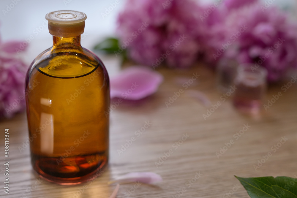 Small glass bottle of peony tincture (water infusion, extract, perfume ...
