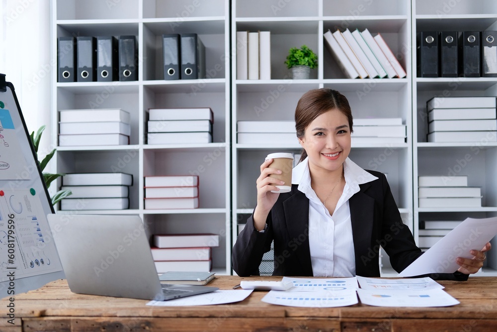 Female attractive asian banker accountant wearing red formal suit ...