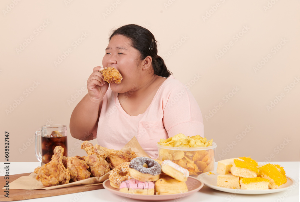obesity young women binge eating disorder concept with woman eating ...